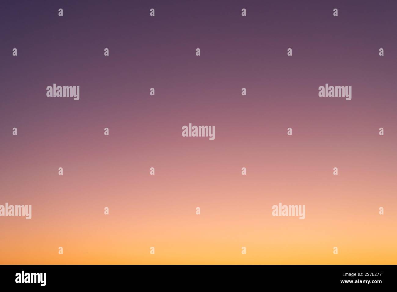 Clear sunset sky background. Vibrant gradient from orange to purple ...