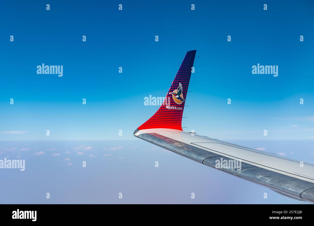 Airlink, South African airline plane wing seen through window above ...