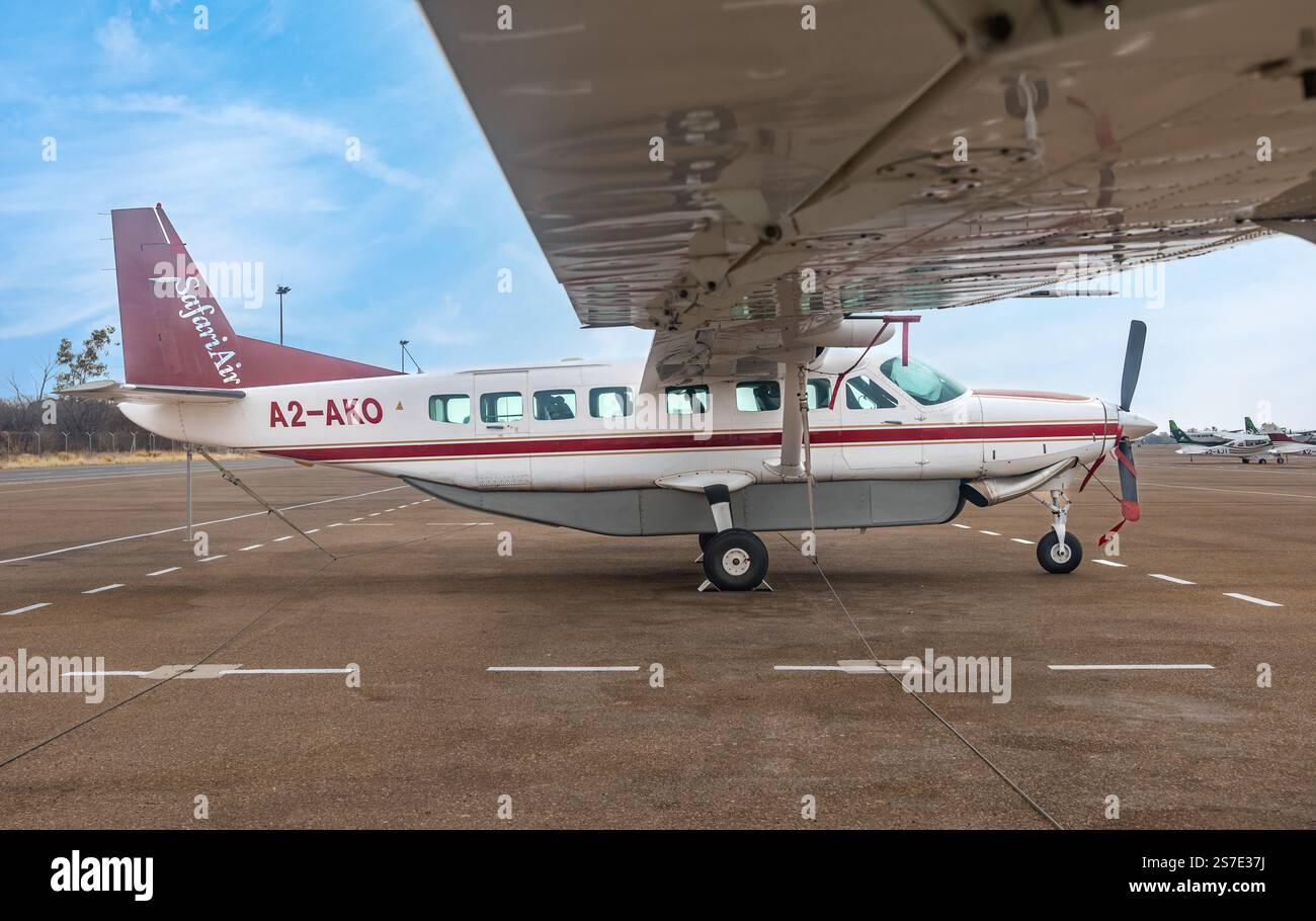 Safari Air tourist transport aeroplane on tarmac runway, Maun airport ...