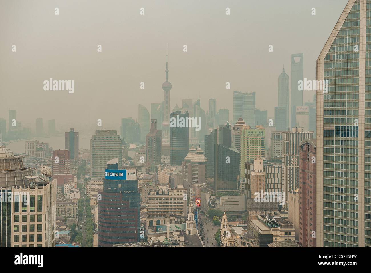 Skyscrapers on a smoggy day in Shanghai, China. Air pollution is a ...