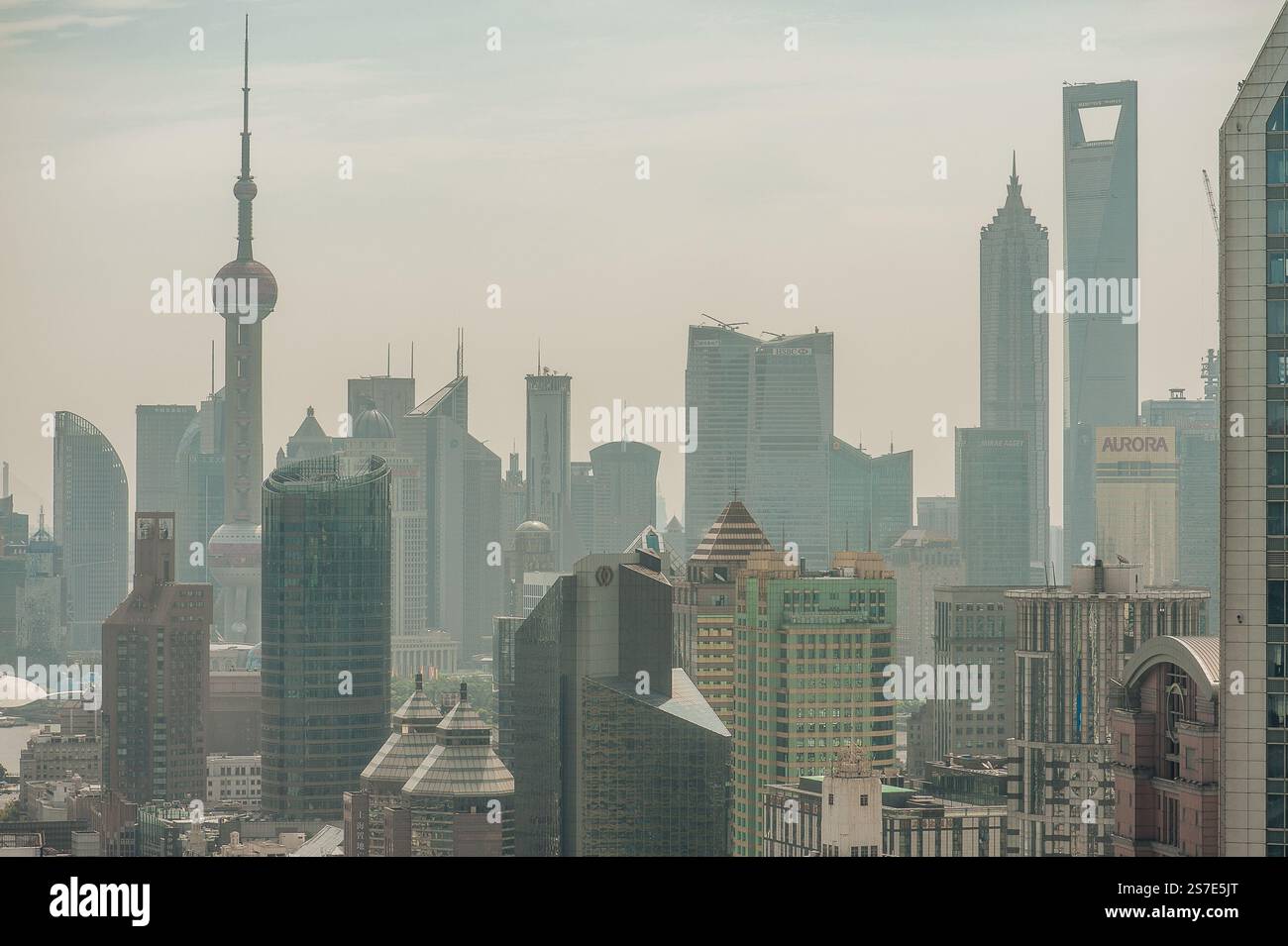 Skyscrapers on a smoggy day in Shanghai, China. Air pollution is a ...