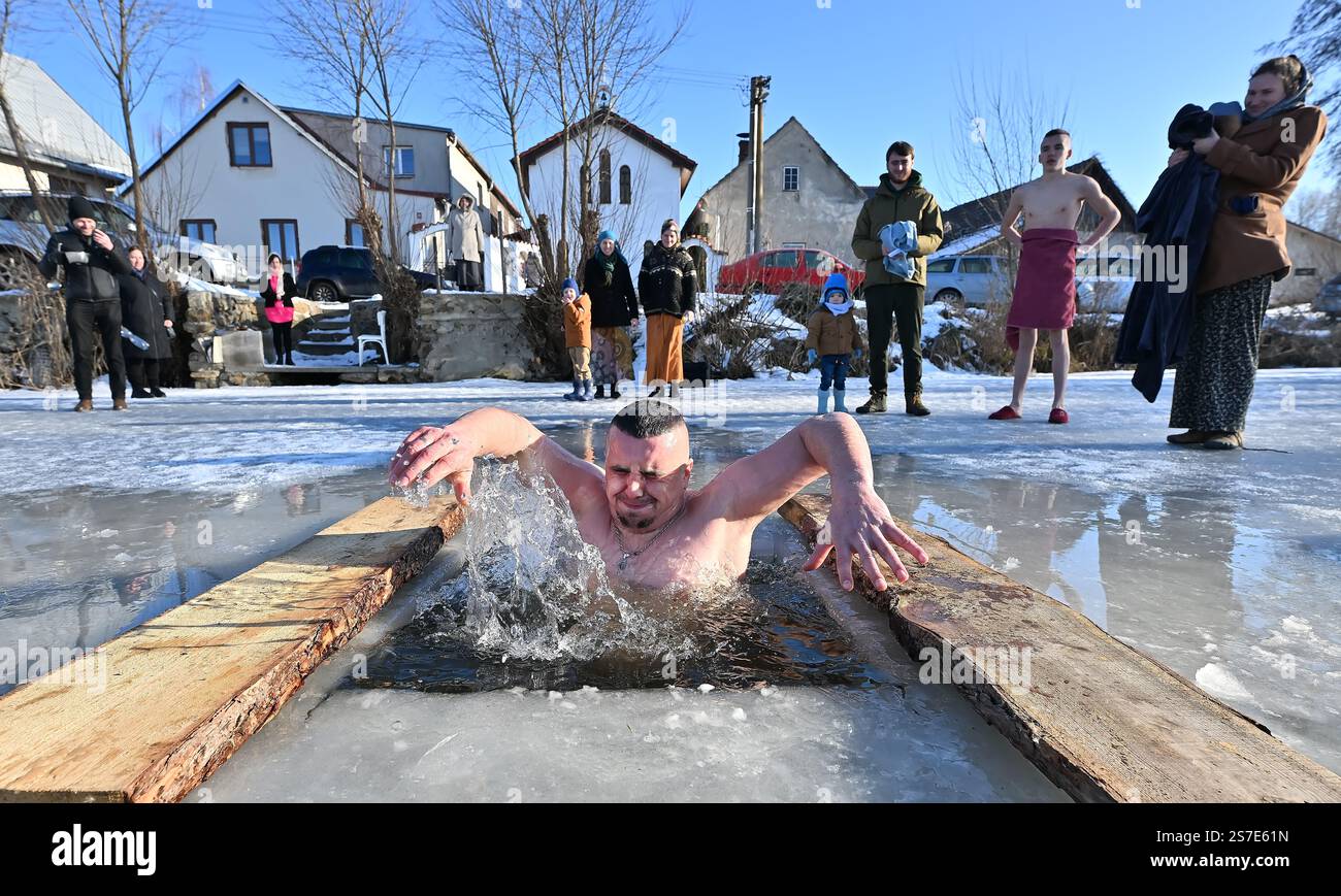 Jezdovice, Czech Republic. 19th Jan, 2025. Orthodox believers bathing ...