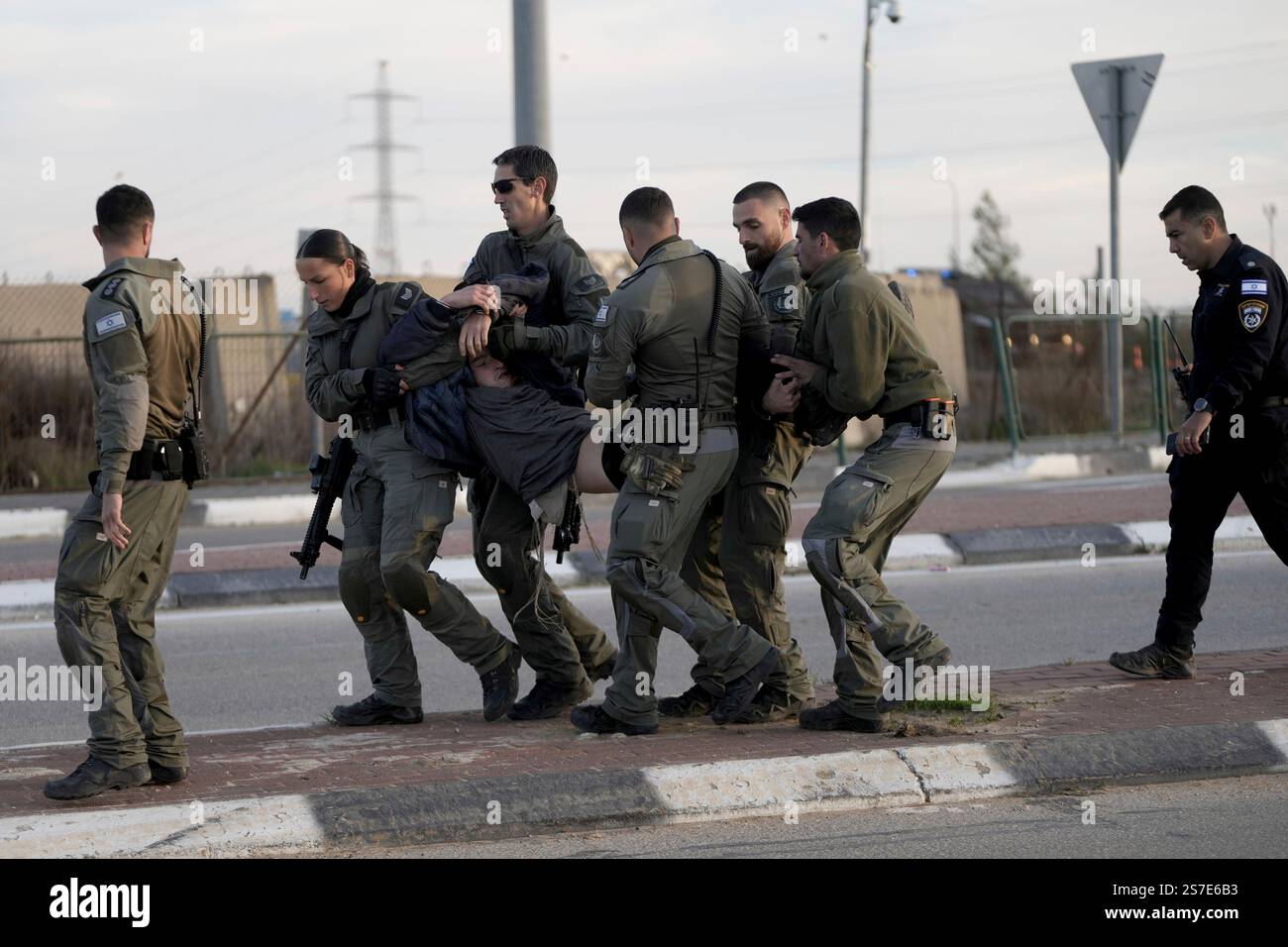 A jewish man is detained by Israeli soldiers in front of the Ofer ...