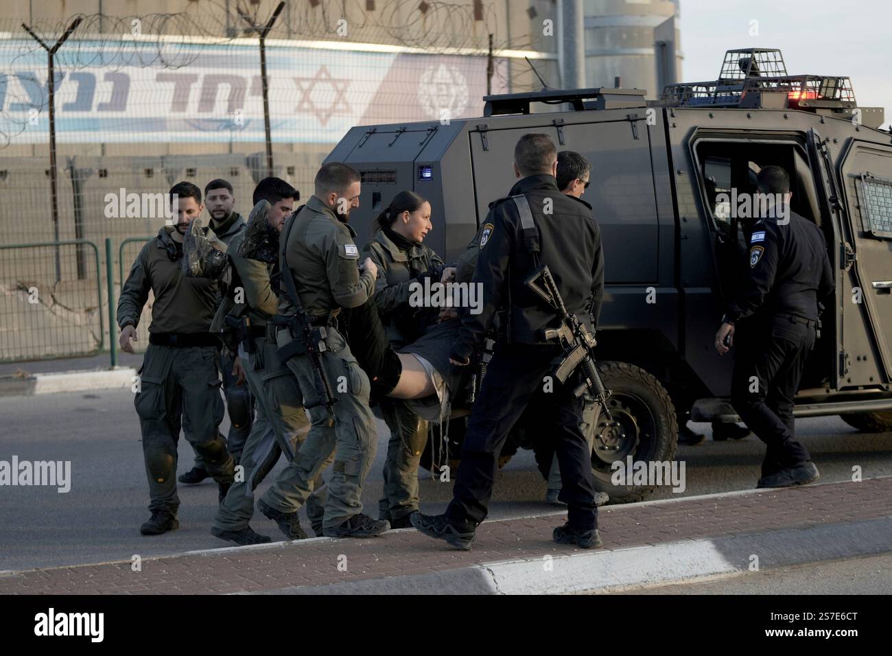 A jewish man is detained by Israeli soldiers in front of the Ofer ...