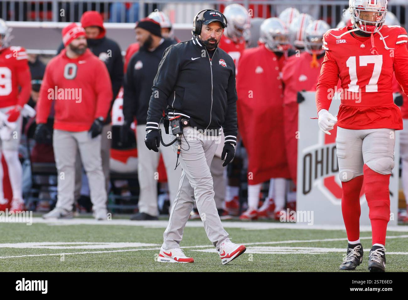 FILE - Ohio State head coach Ryan Day, center, looks on during the ...