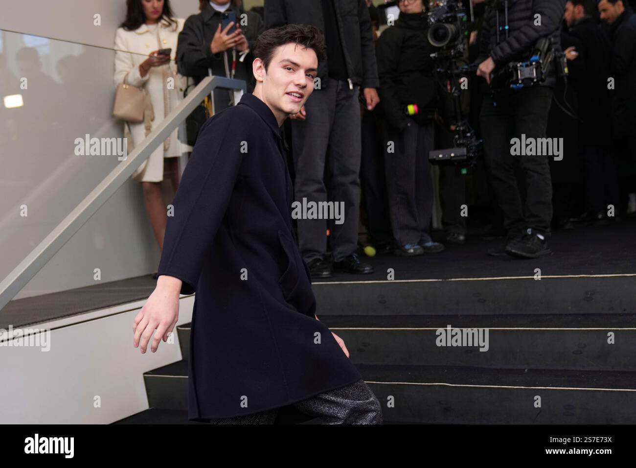 Louis Partridge arrives as he attends at the men's Prada Fall-Winter ...
