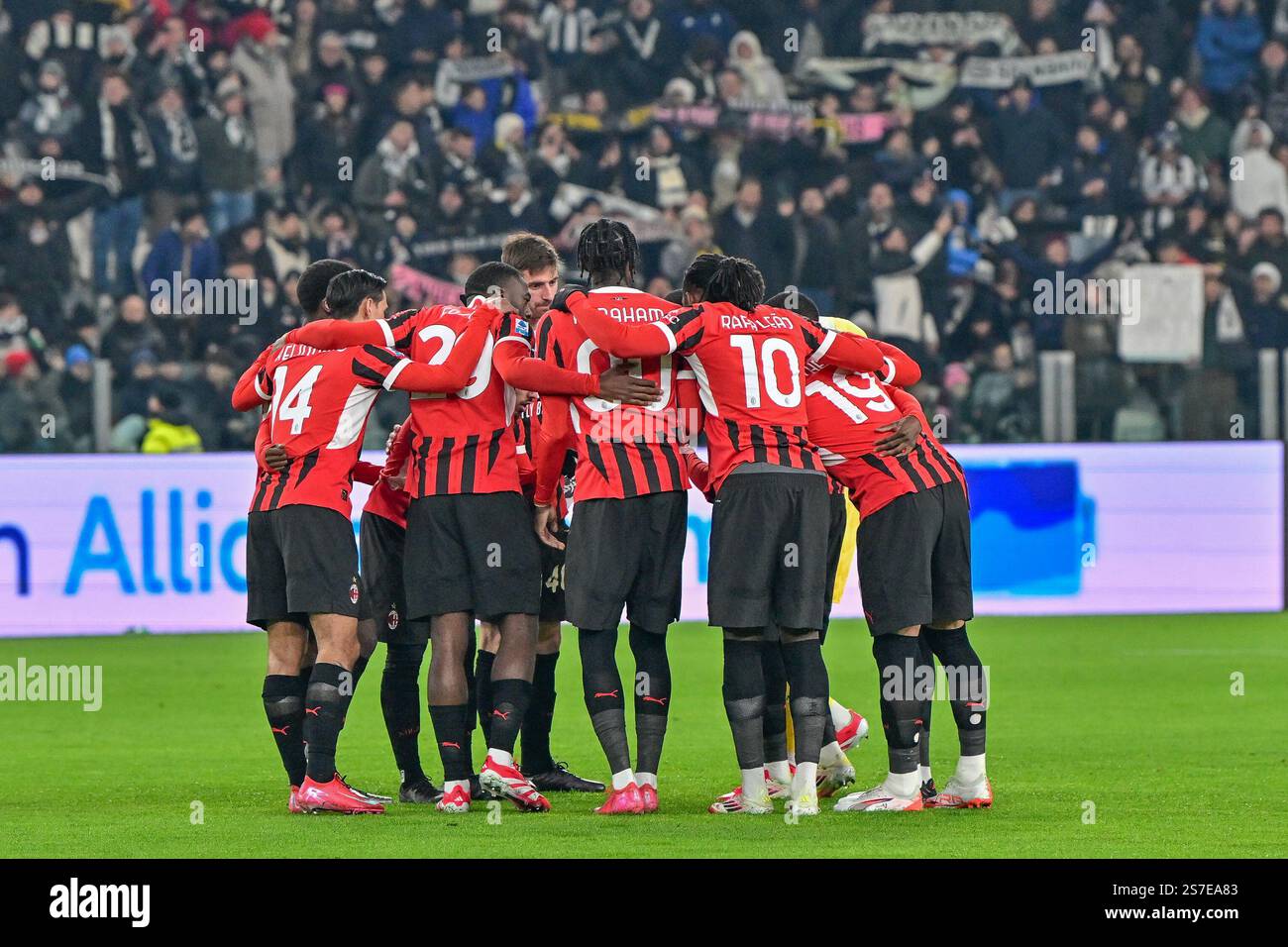 Turin, Italy. 18th Jan, 2025. The players of of AC Milan unite in a ...