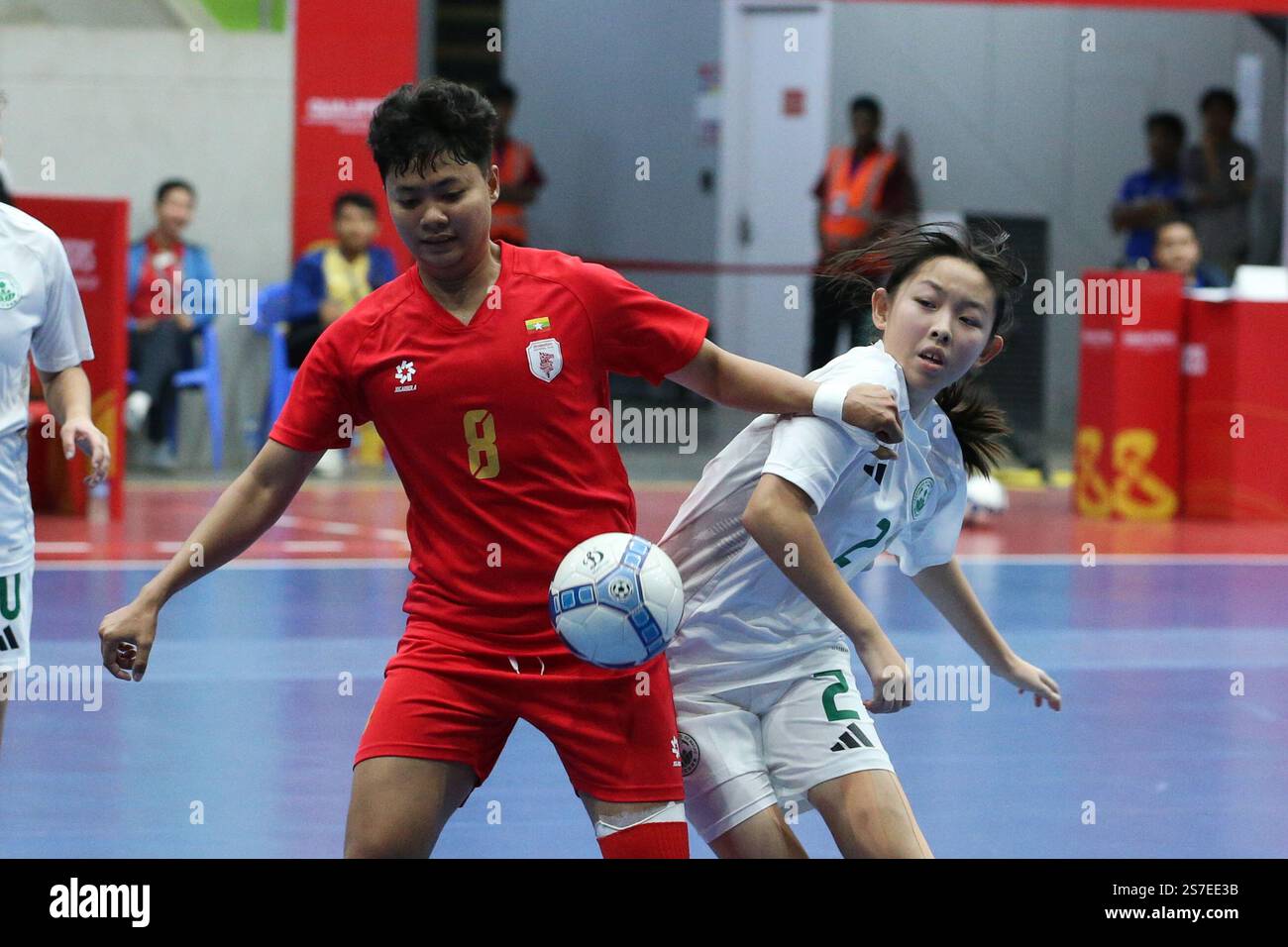 Yangon, Myanmar. 19th Jan, 2025. May Thet Paing (L) of Myanmar vies against Tou Hio Cheng of ...