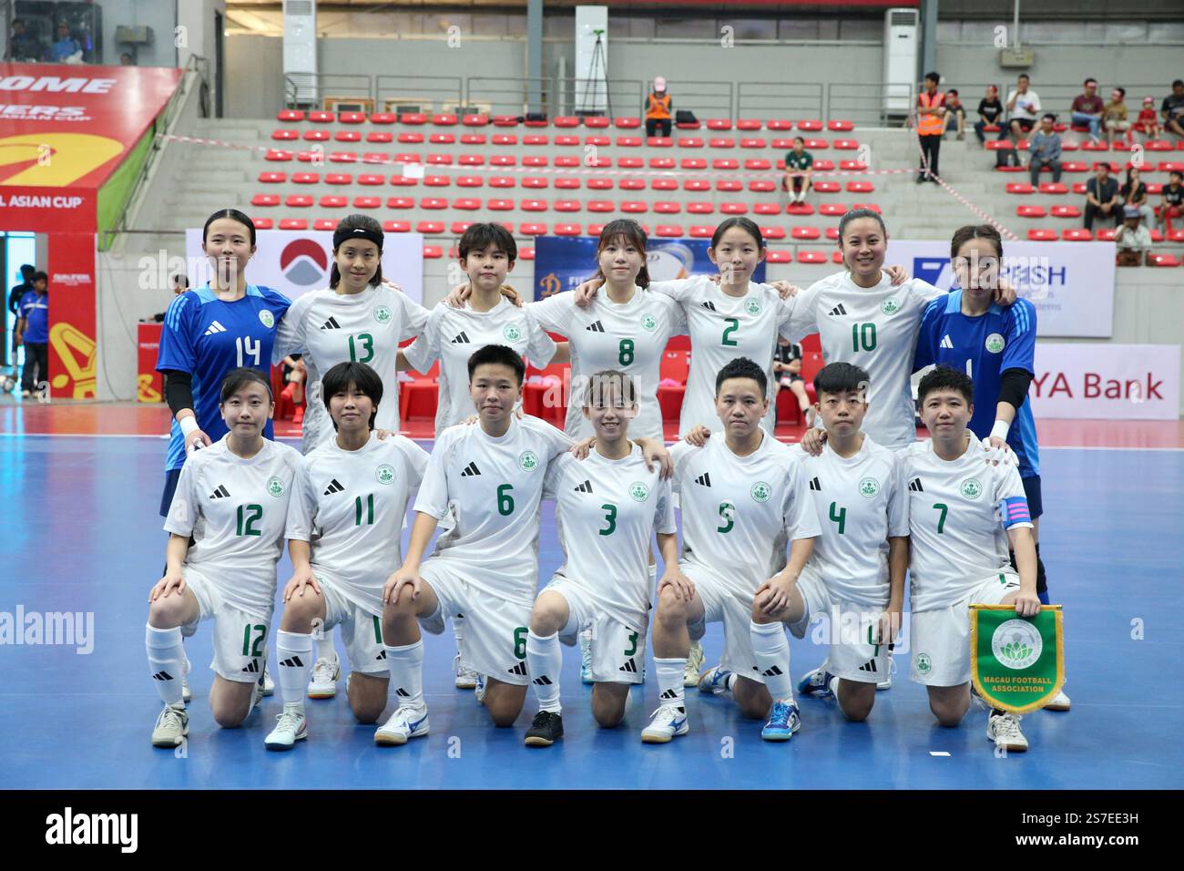 Yangon, Myanmar. 19th Jan, 2025. Starting players of China's Macau pose for a group photo prior ...
