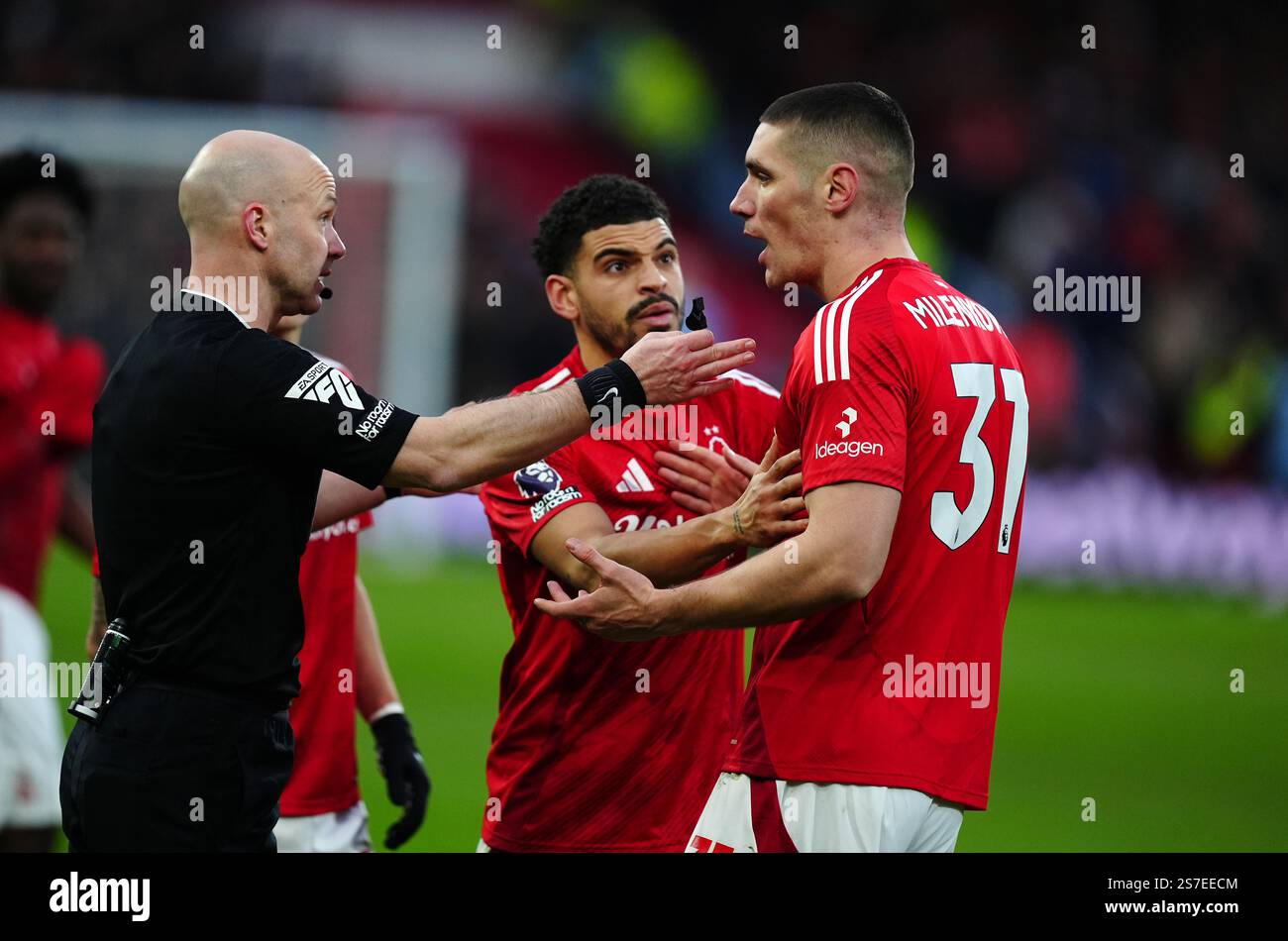 Referee Anthony Taylor speaks to Nottingham Forest's Morgan Gibbs-White ...
