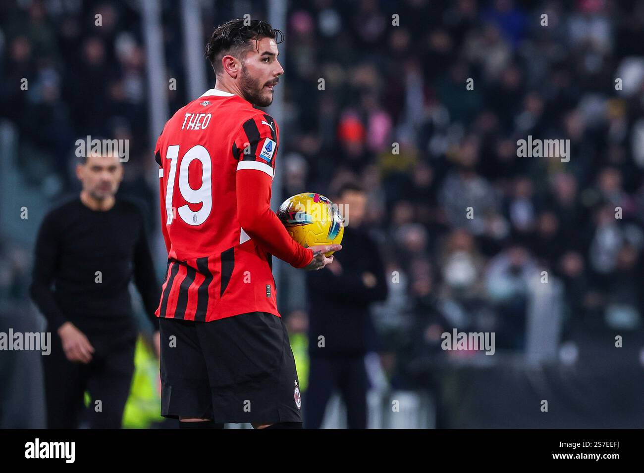 Turin, Italien. 18th Jan, 2025. Theo Hernandez of AC Milan looks on ...