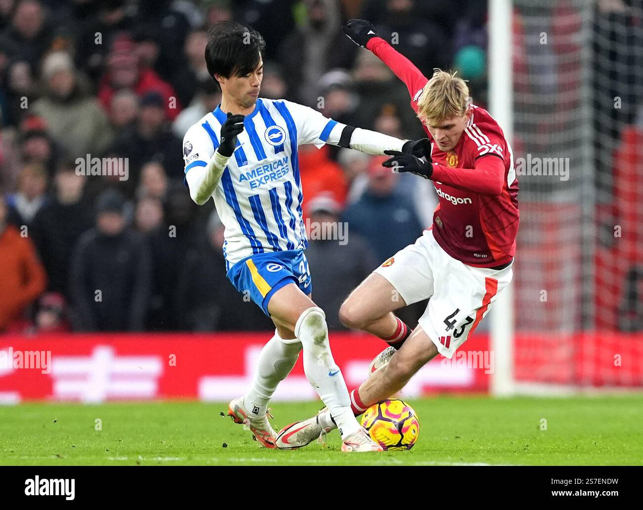 Brighton and Hove Albion's Kaoru Mitoma (left) and Manchester United's ...