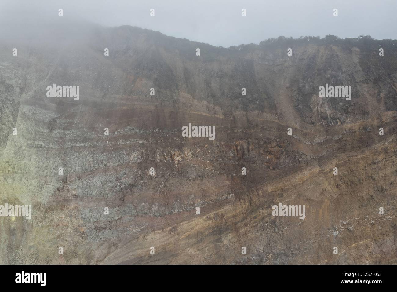 Rock volcano crater hill brown color with different layers Stock Photo ...