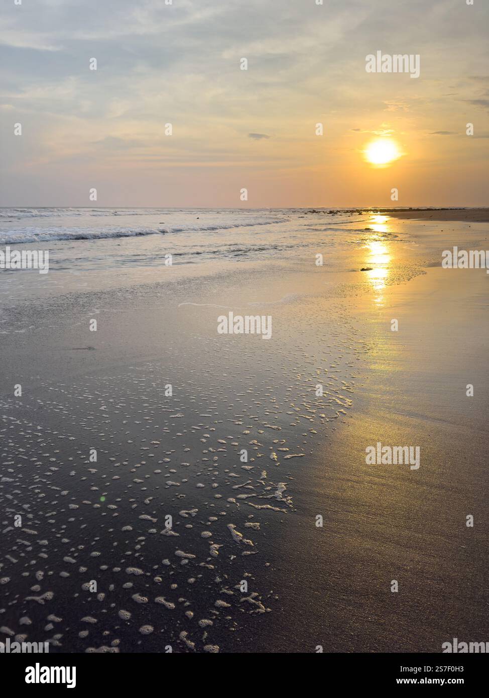 Ocean shore at dusk time colors landscape background Stock Photo - Alamy