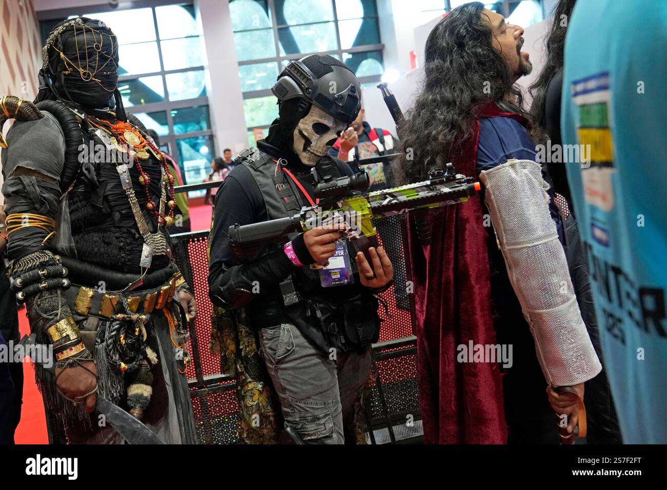 Cosplayers dressed as fictional characters line up to perform at ...