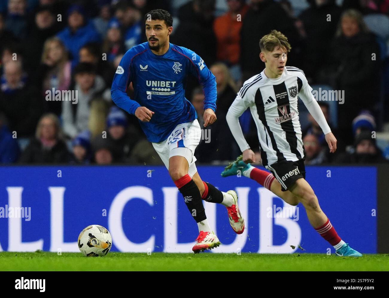 Fraserburgh's Flynn McKay (right) and Rangers' Jefte battle for the ...
