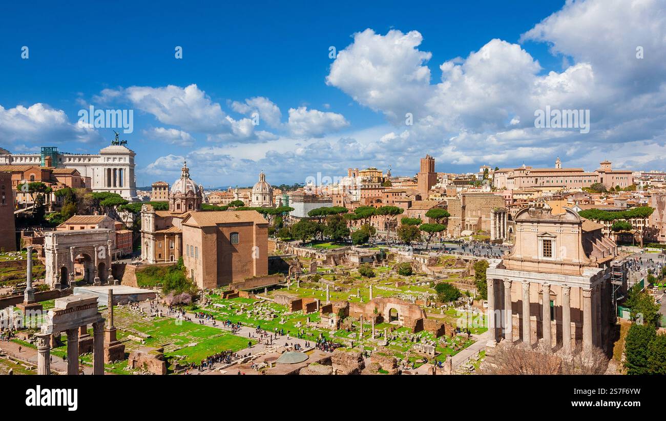 Sightseeing in Rome. Tourists visit Roman Forum ancient ruins Stock ...