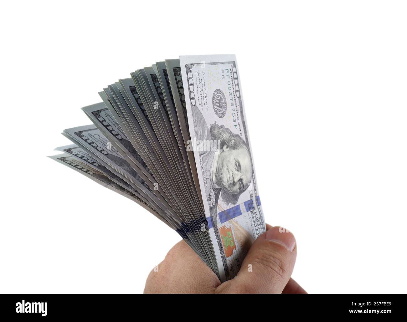 A stack of hundred dollar bills in a man's hand on a white background ...