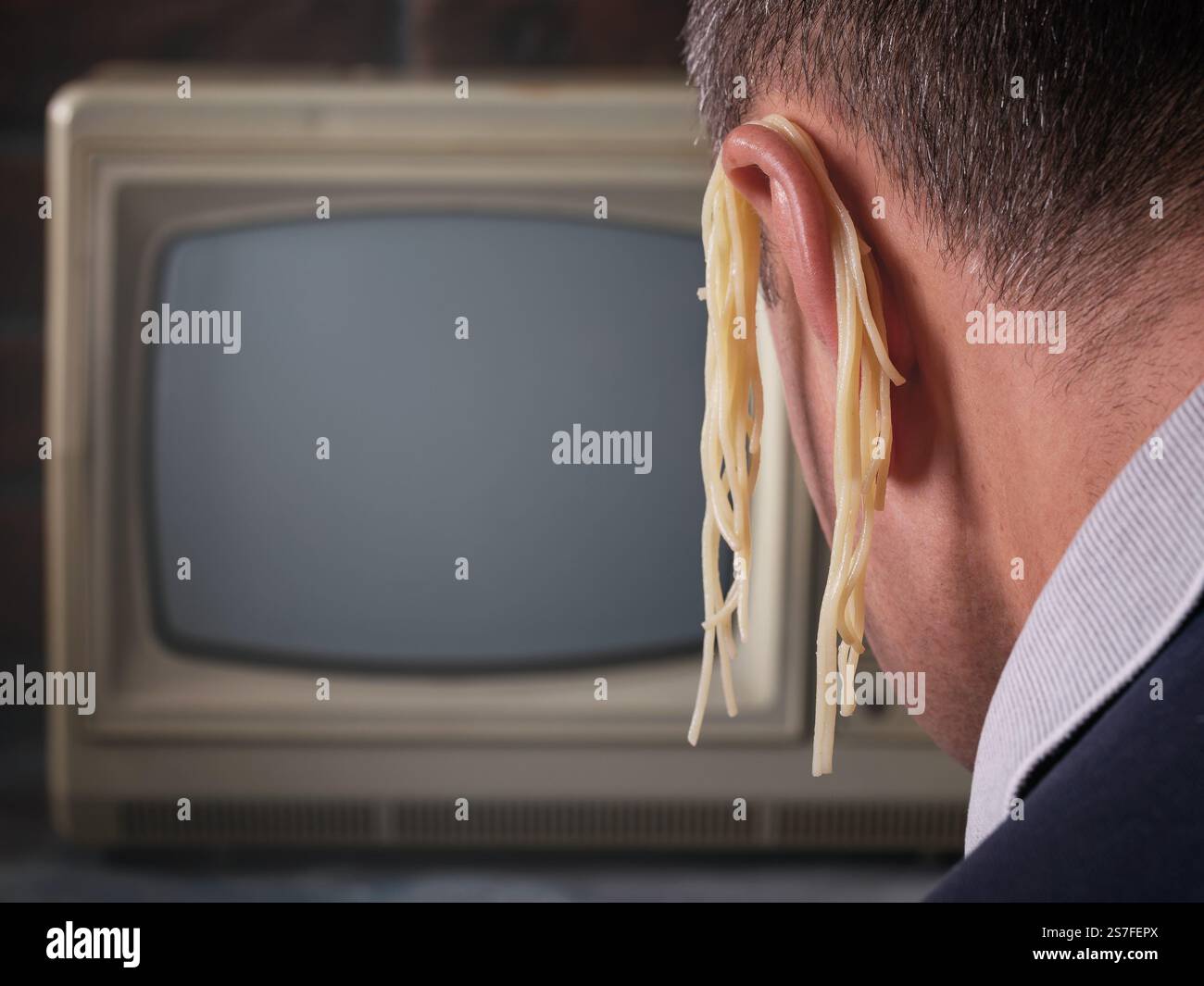 Man watching tv talking close up hi-res stock photography and images ...