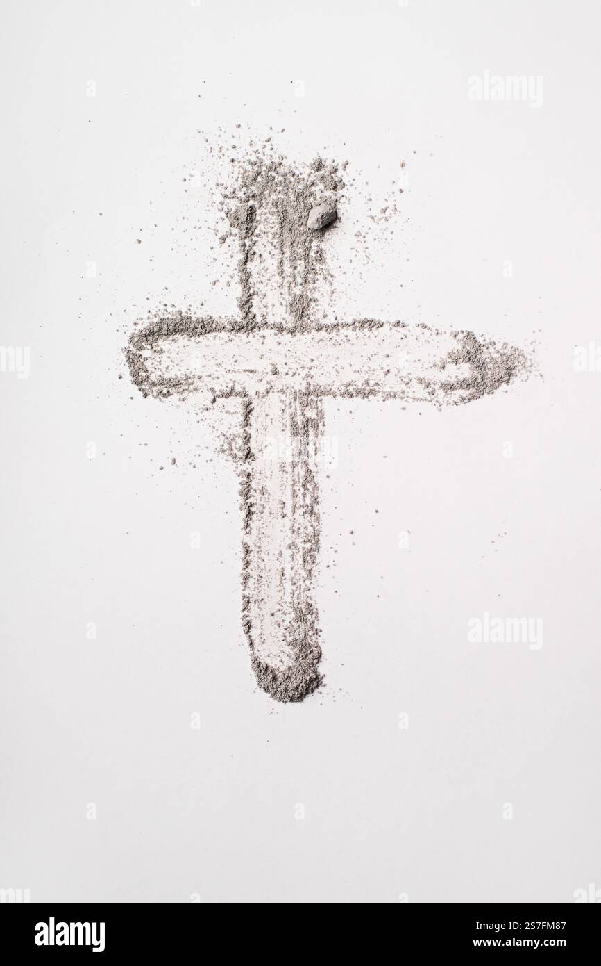 Ash cross symbol on white background for lent and religious reflection ...
