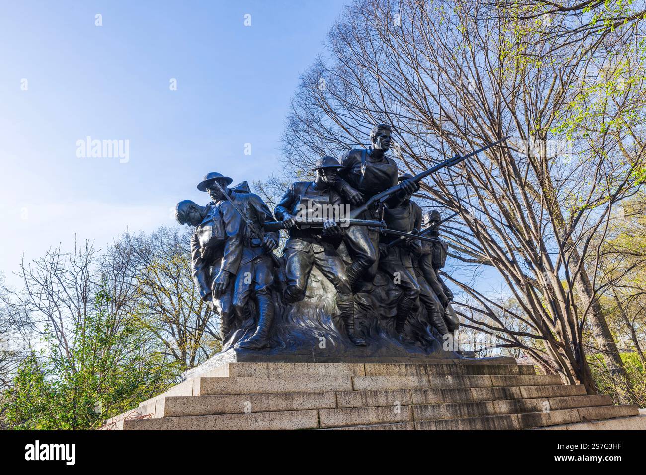 Bronze sculpture of soldiers advancing in battle, mounted on stone ...