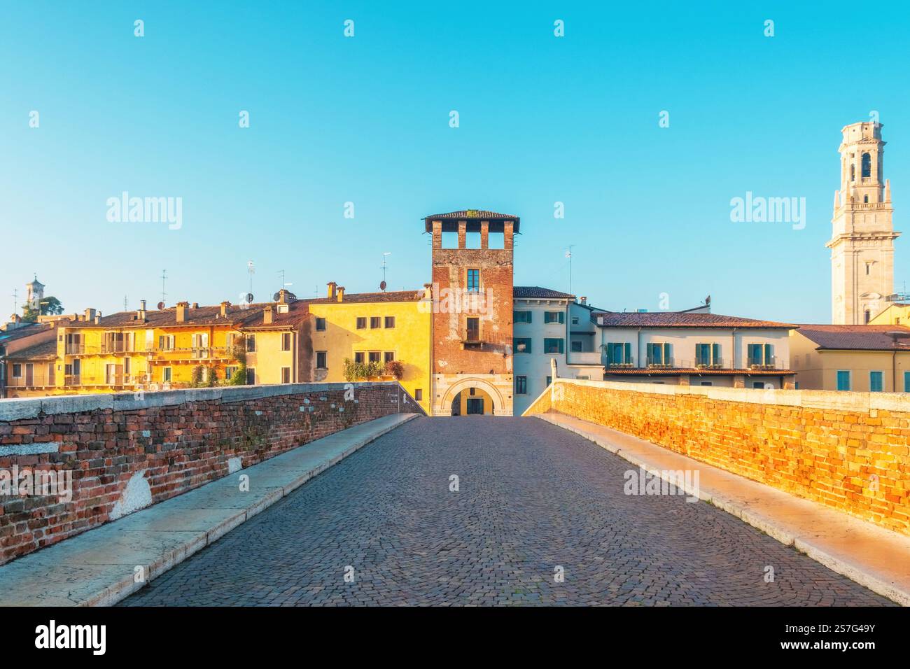 Ponte Pietra historic Roman arch bridge in Verona across Adige river ...