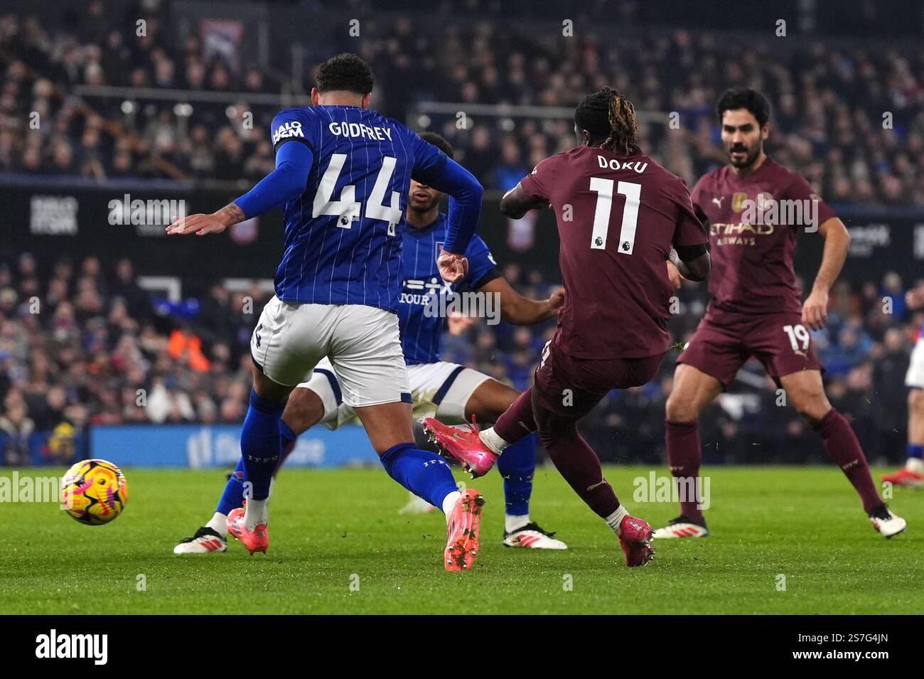 Manchester City's Jeremy Doku scores their side's fourth goal of the ...
