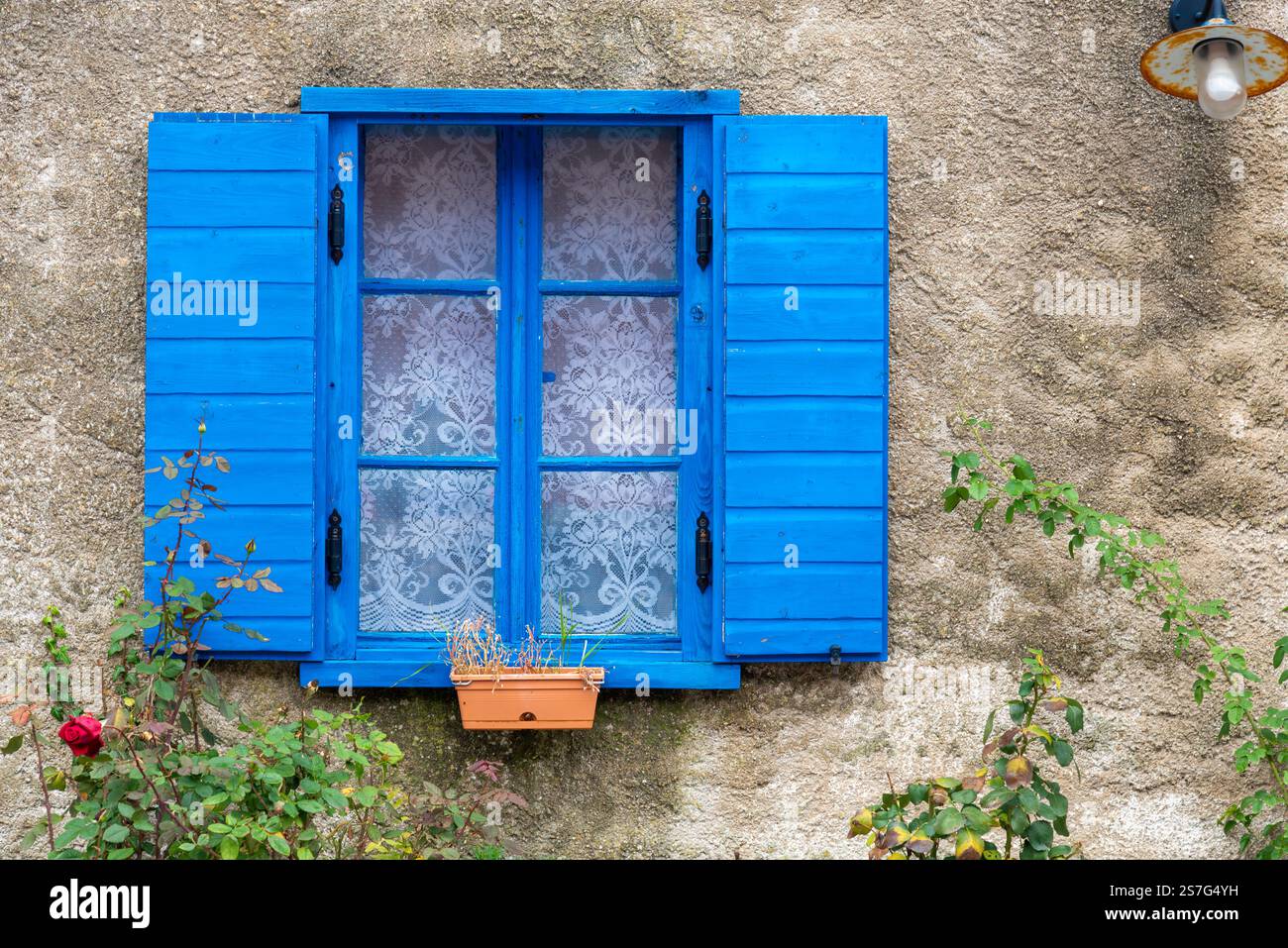 Picturesque view with blue window in Nin. Nin is a small town located ...