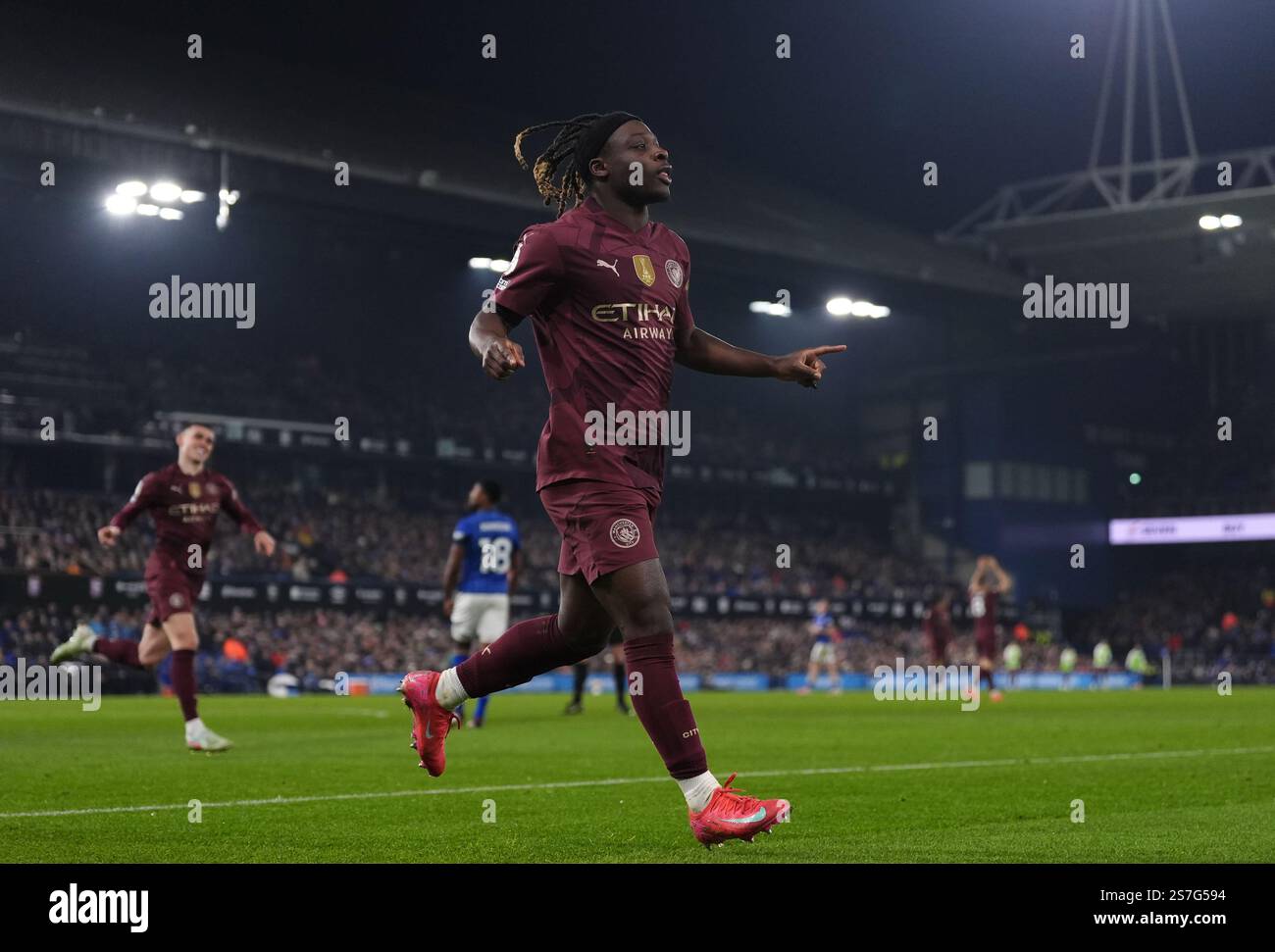 Manchester City's Jeremy Doku celebrates scoring their side's fourth ...