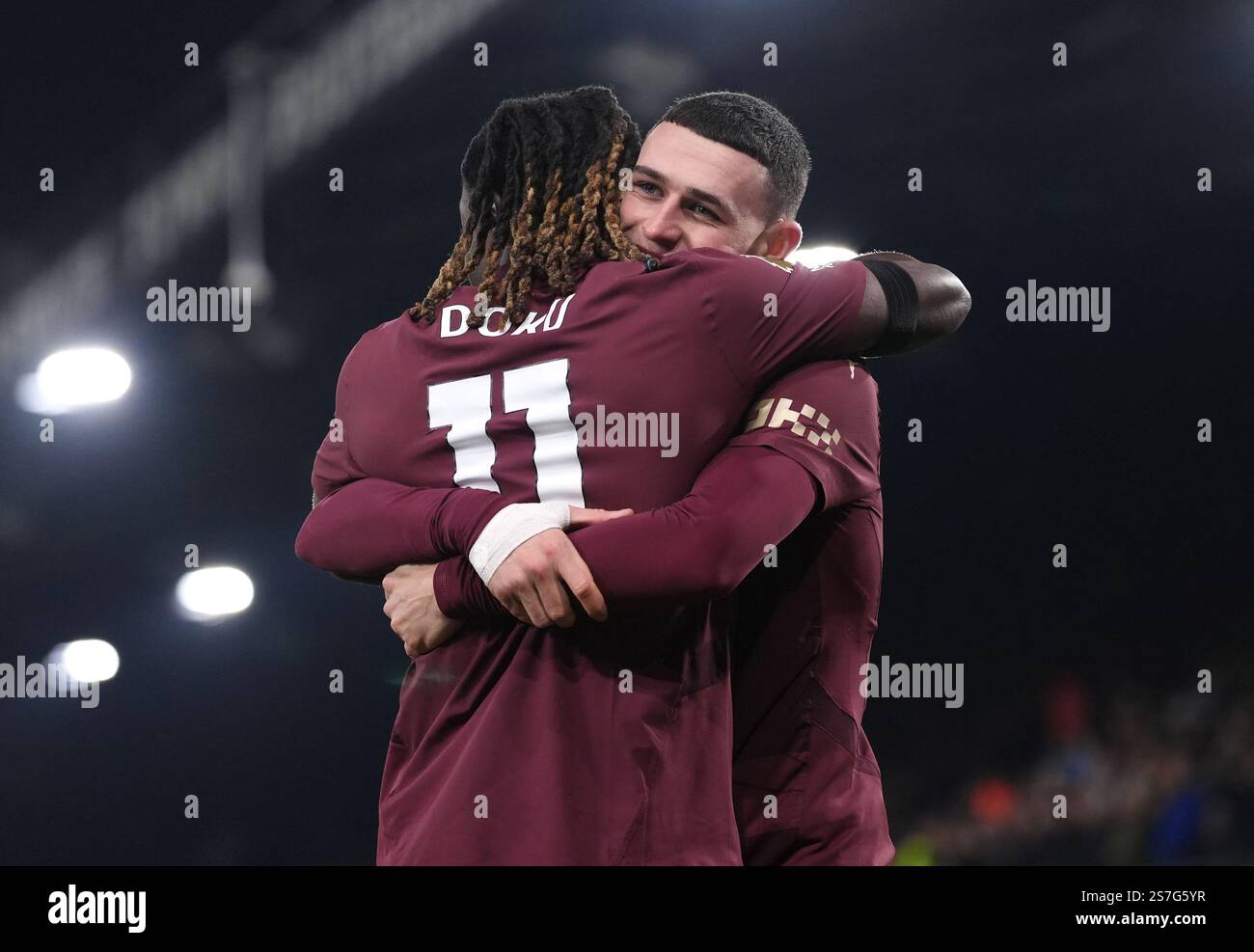 Manchester City's Jeremy Doku celebrates scoring their side's fourth ...