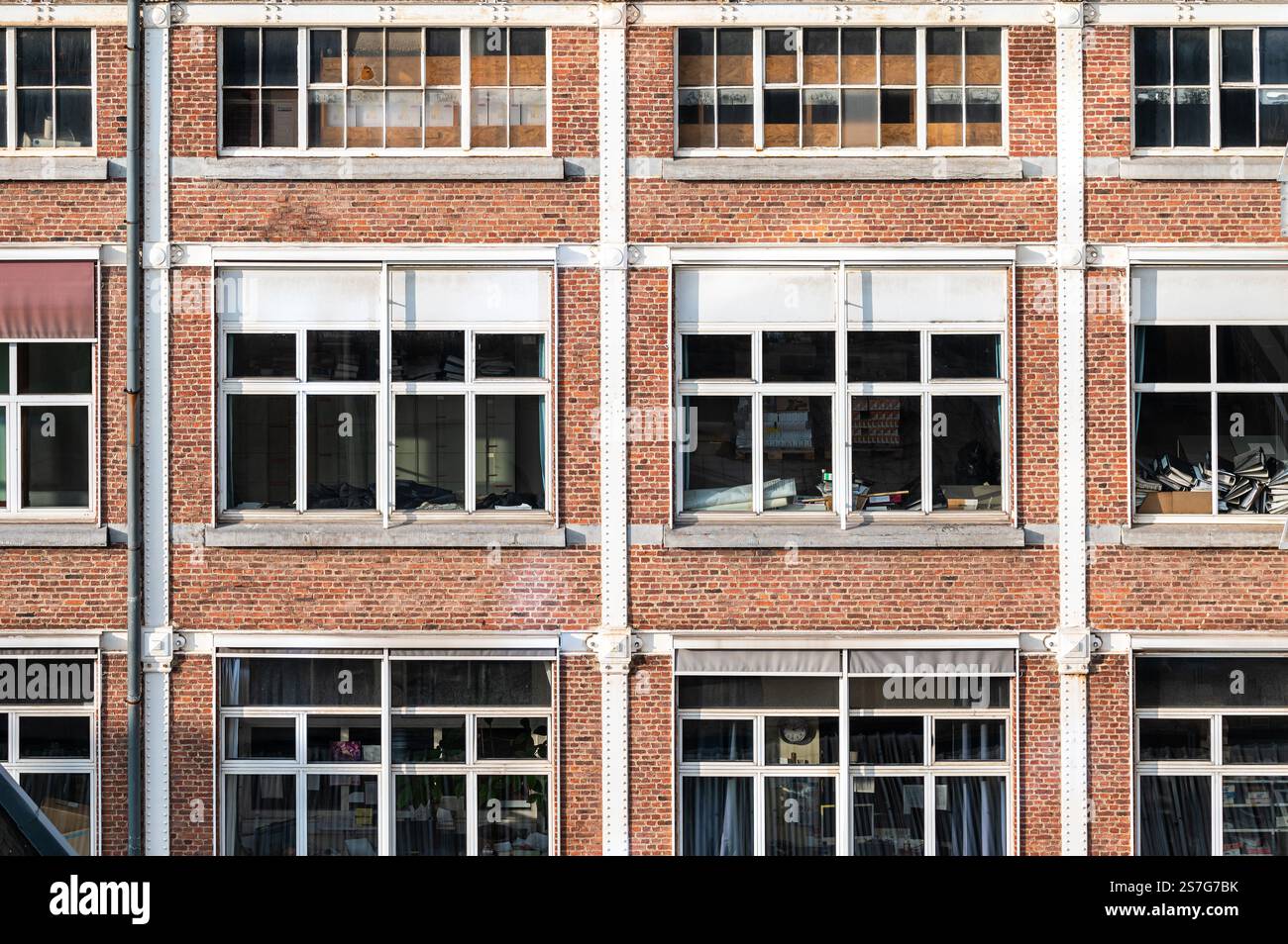 Renovated brick stone facade of office buildings in Brussels old town ...