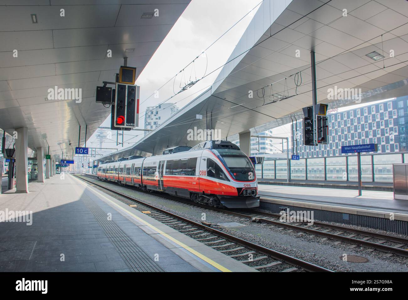 The train is on the platform at Vienna Central Station in the Austrian ...