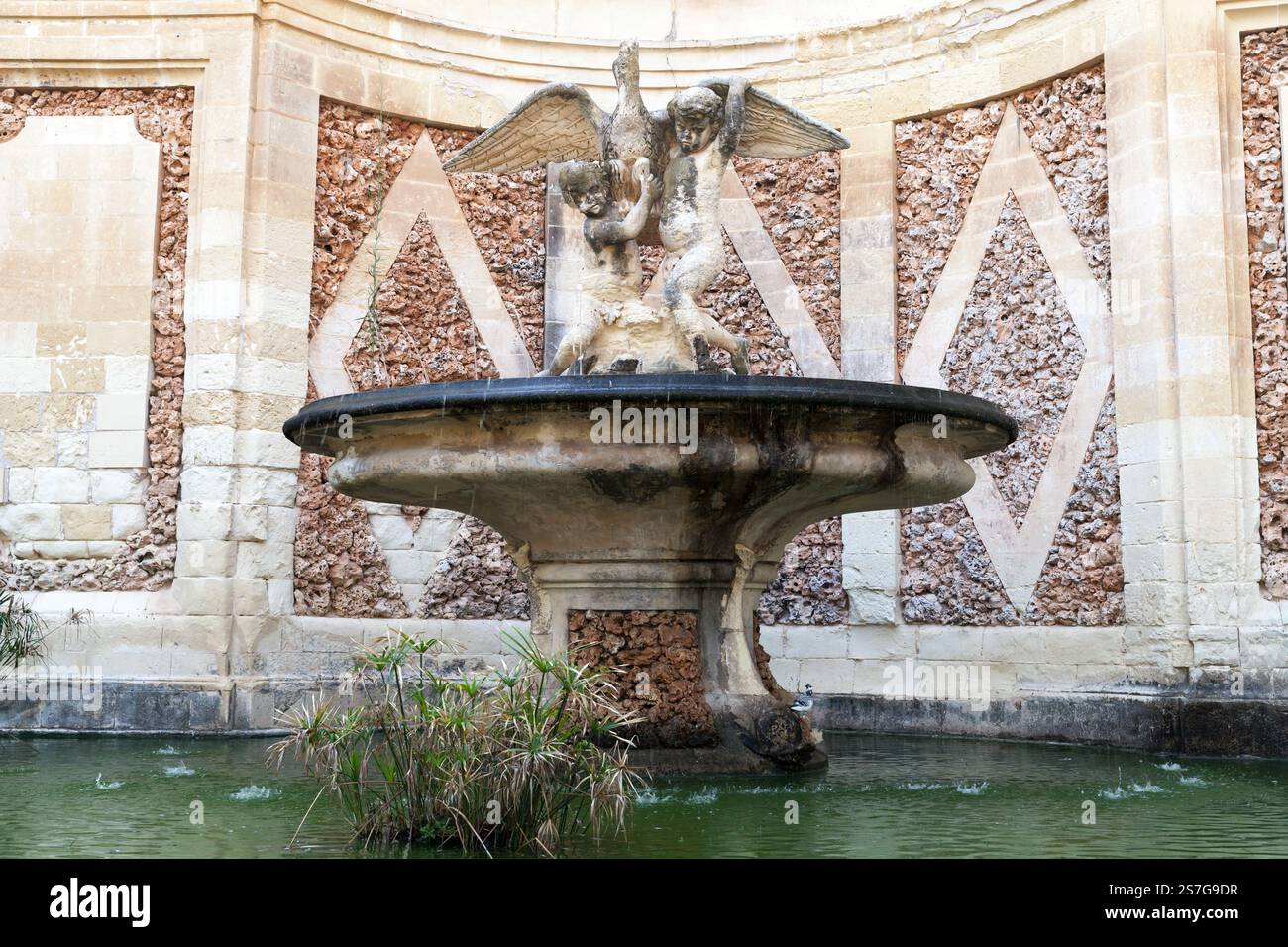 Attard, Malta - August 25: Ancient fountain of San Anton Gardens with ...