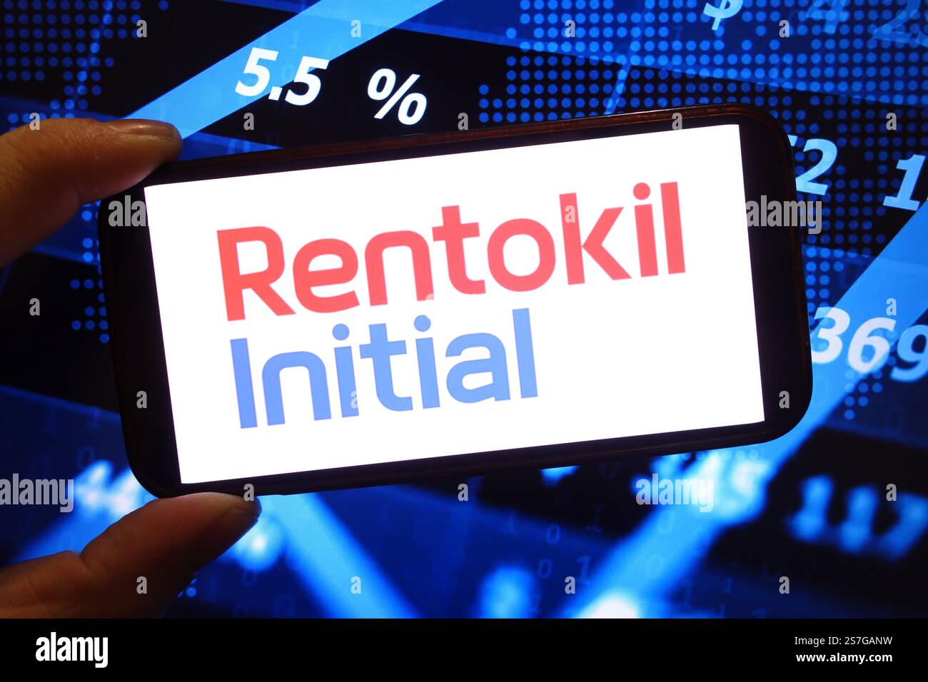 In this photo illustration, the Rentokil Initial company logo is seen ...