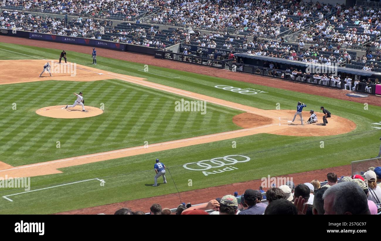A sunny day at New York's iconic Yankee Stadium captures the pitcher ...