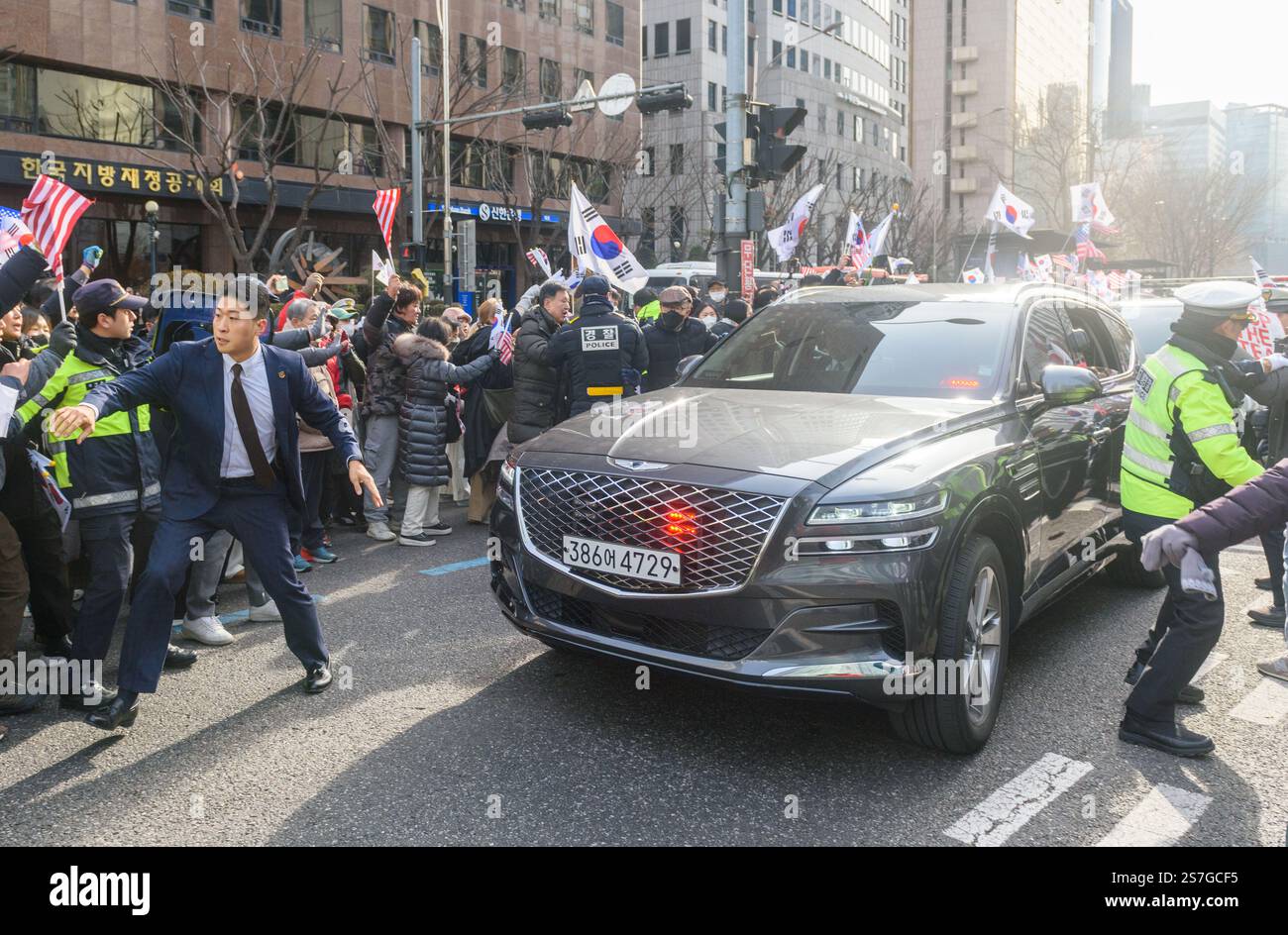 Presidential bodyguards and police are seen pushing supporters of the ...