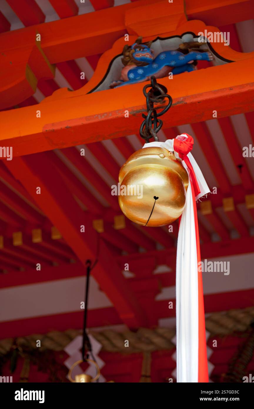 Red and white streamers hanging from "suzu" (shrine bells) used to ...