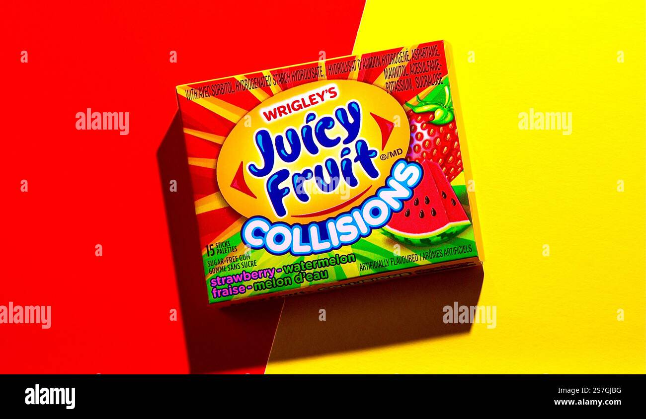 A pack of Wrigley's Juicy Fruit Collisions gum in strawberry and ...