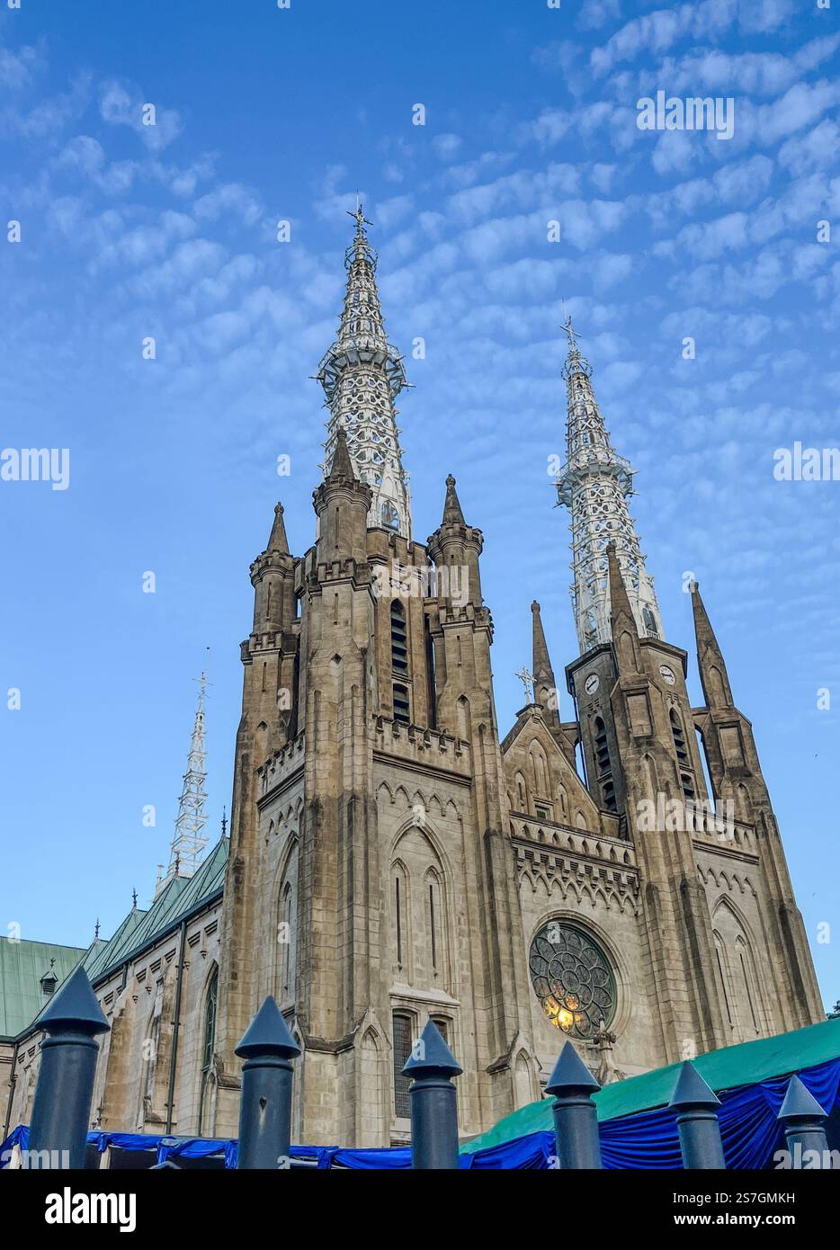 Cathedral Jakarta stands tall beneath a clear blue sky, showcasing its ...
