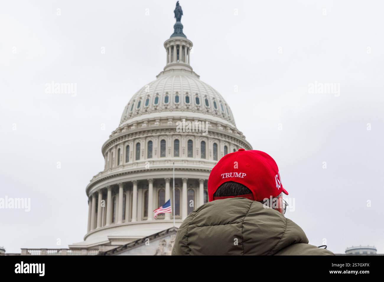 Washington, United States. 19th Jan, 2025. A person in a MAGA hat is ...