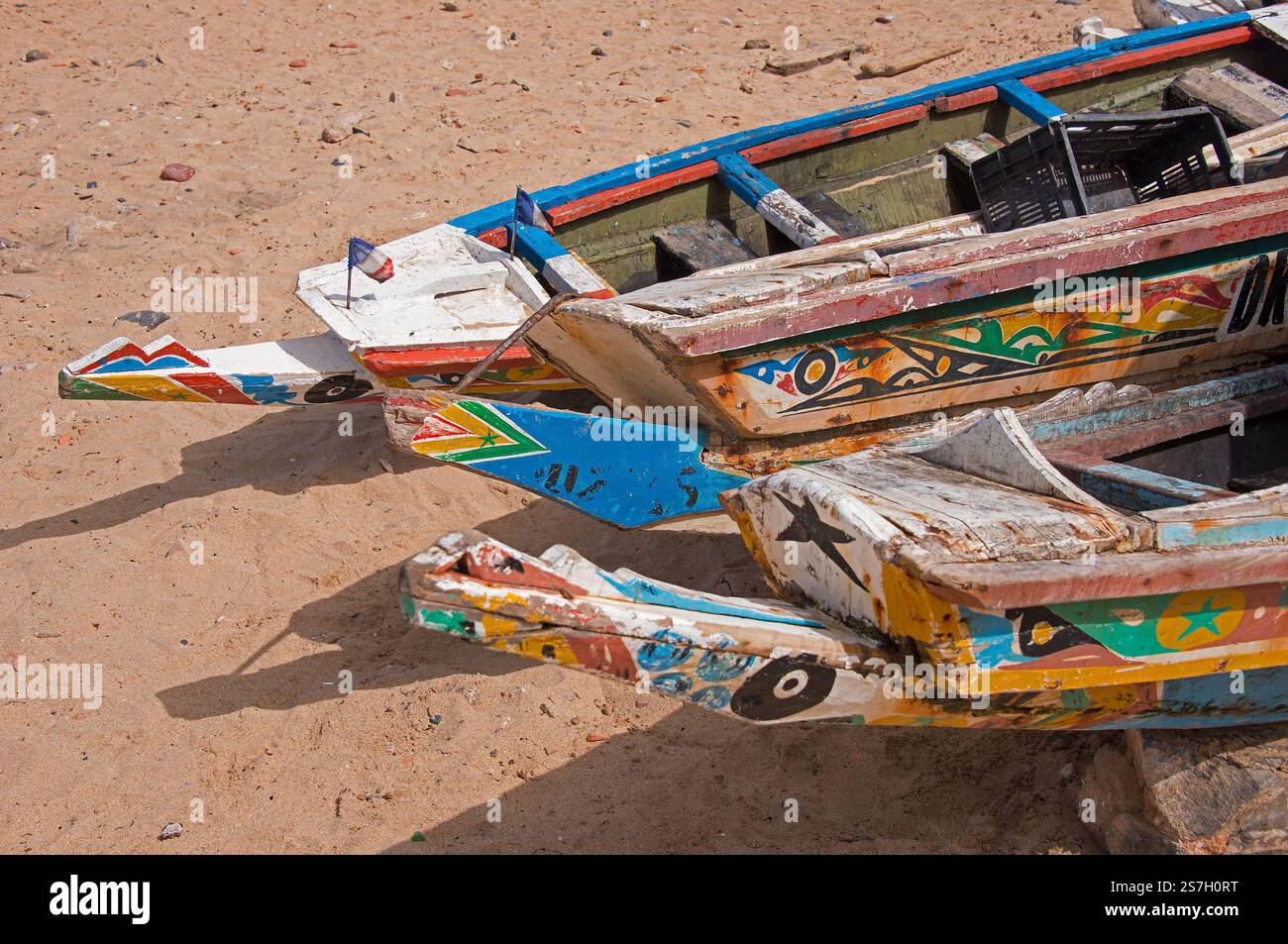 Decorated fishing boats on the beaches of the Senegalese coast Stock ...
