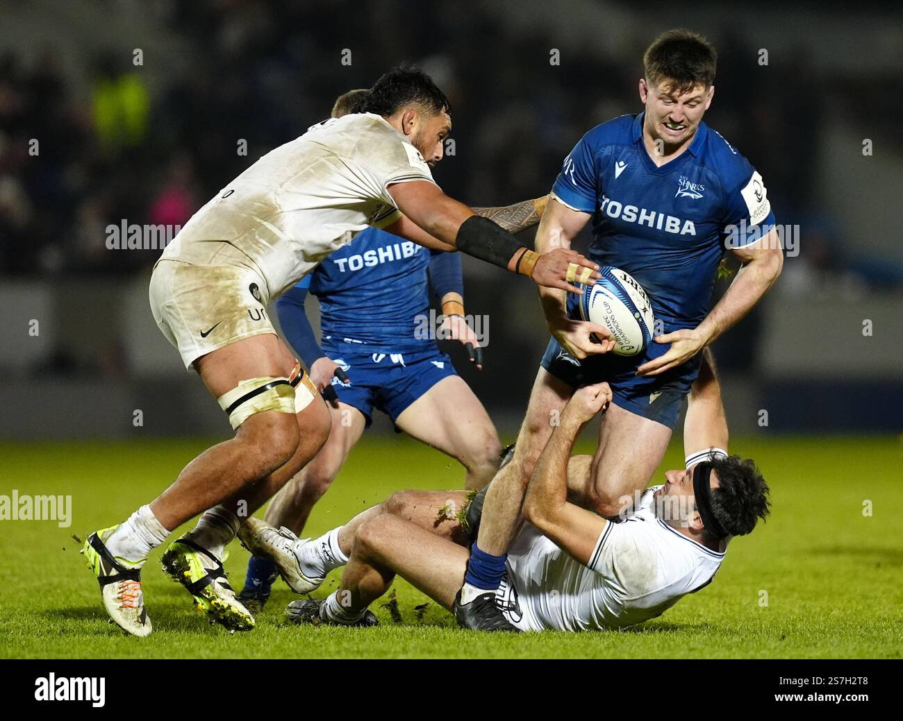 Sale Sharks' Ben Curry tackled by Toulon's Matthias Halagahu and Jeremy ...
