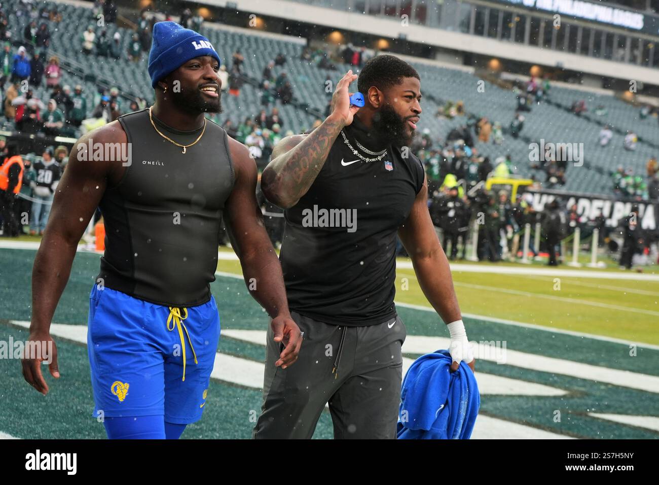Los Angeles Rams linebacker Byron Young, left, and linebacker Jared ...
