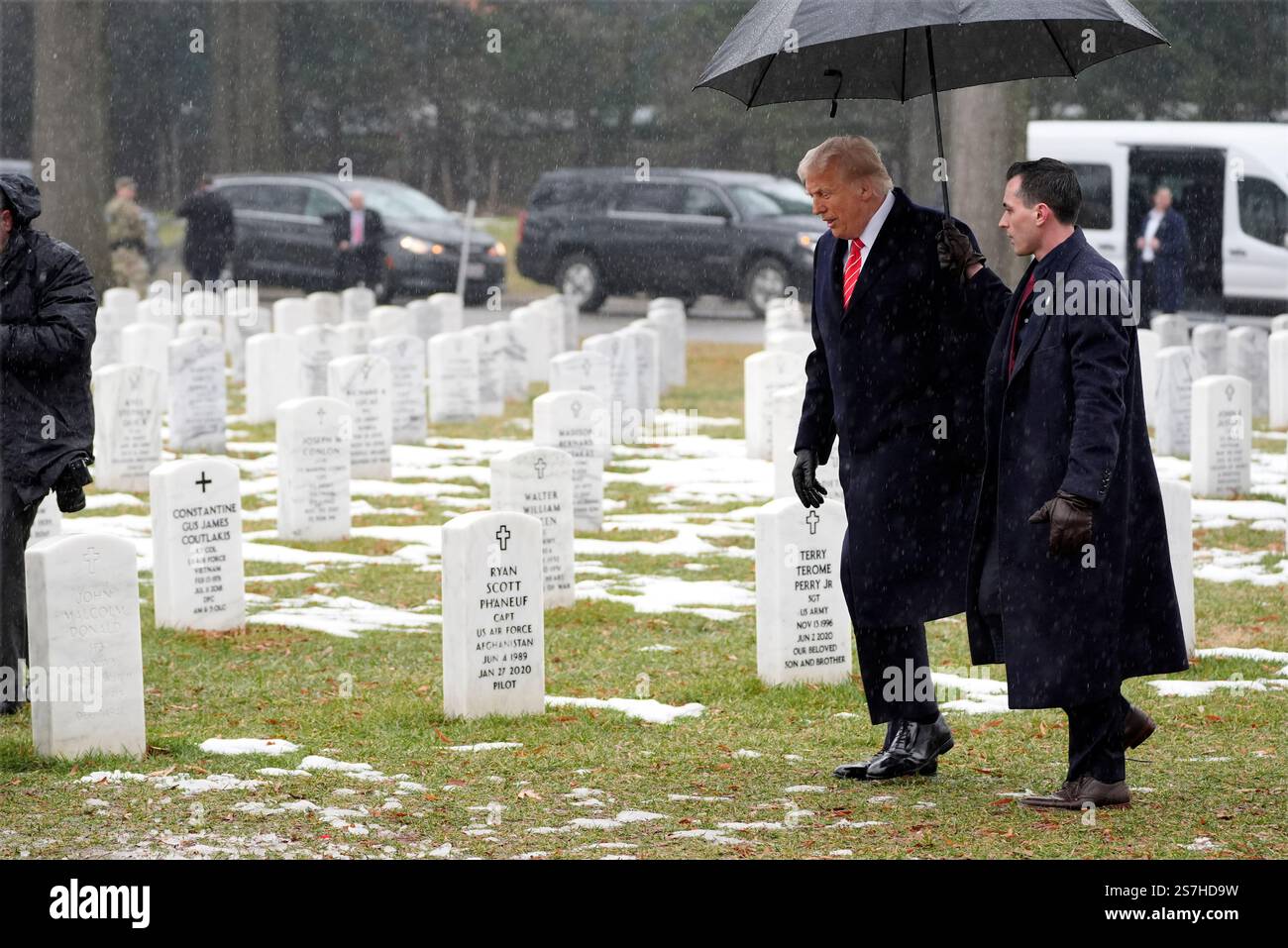 President-elect Donald Trump walks at Section 60 at Arlington National ...