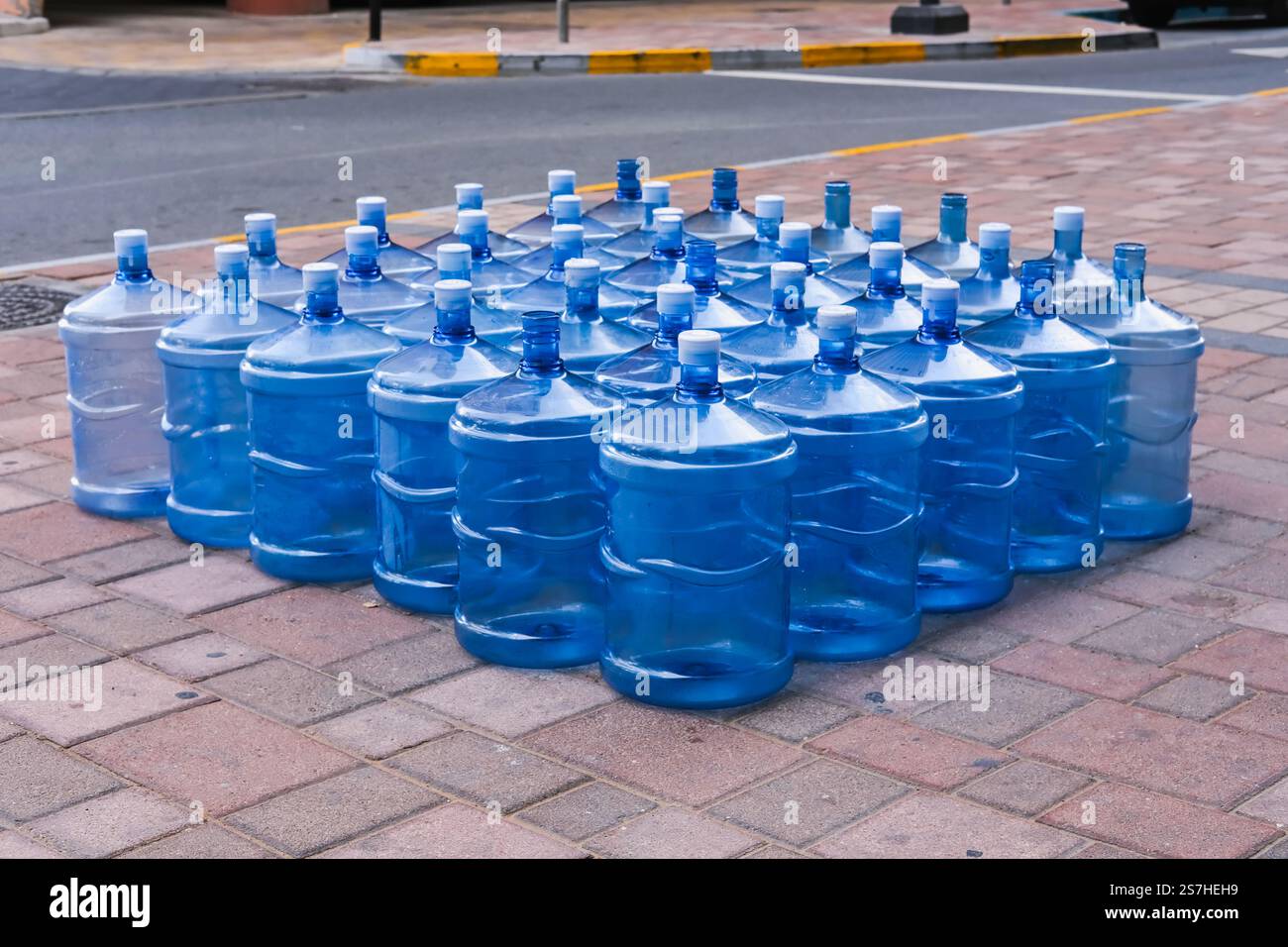 Bottled drinking desalinated water delivery in UAE. Empty refillable ...