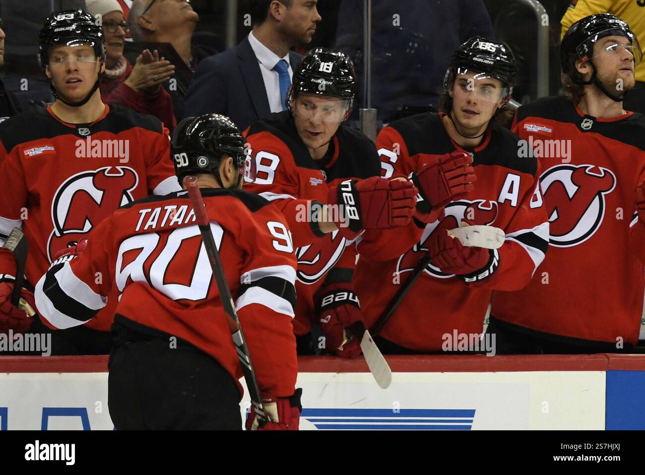 New Jersey Devils' Tomas Tatar, left, celebrates with Ondrej Palat ...
