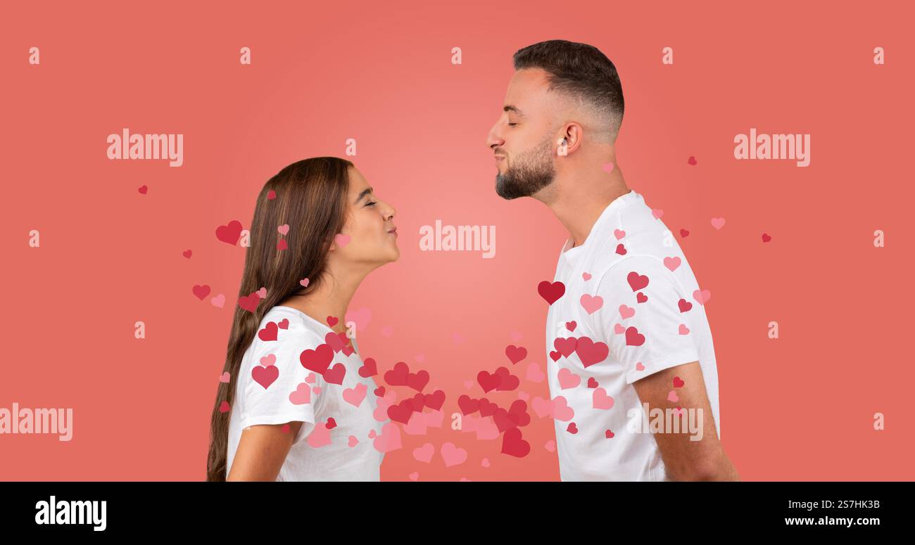 Couple sharing a loving kiss with hearts for Valentine's Day ...