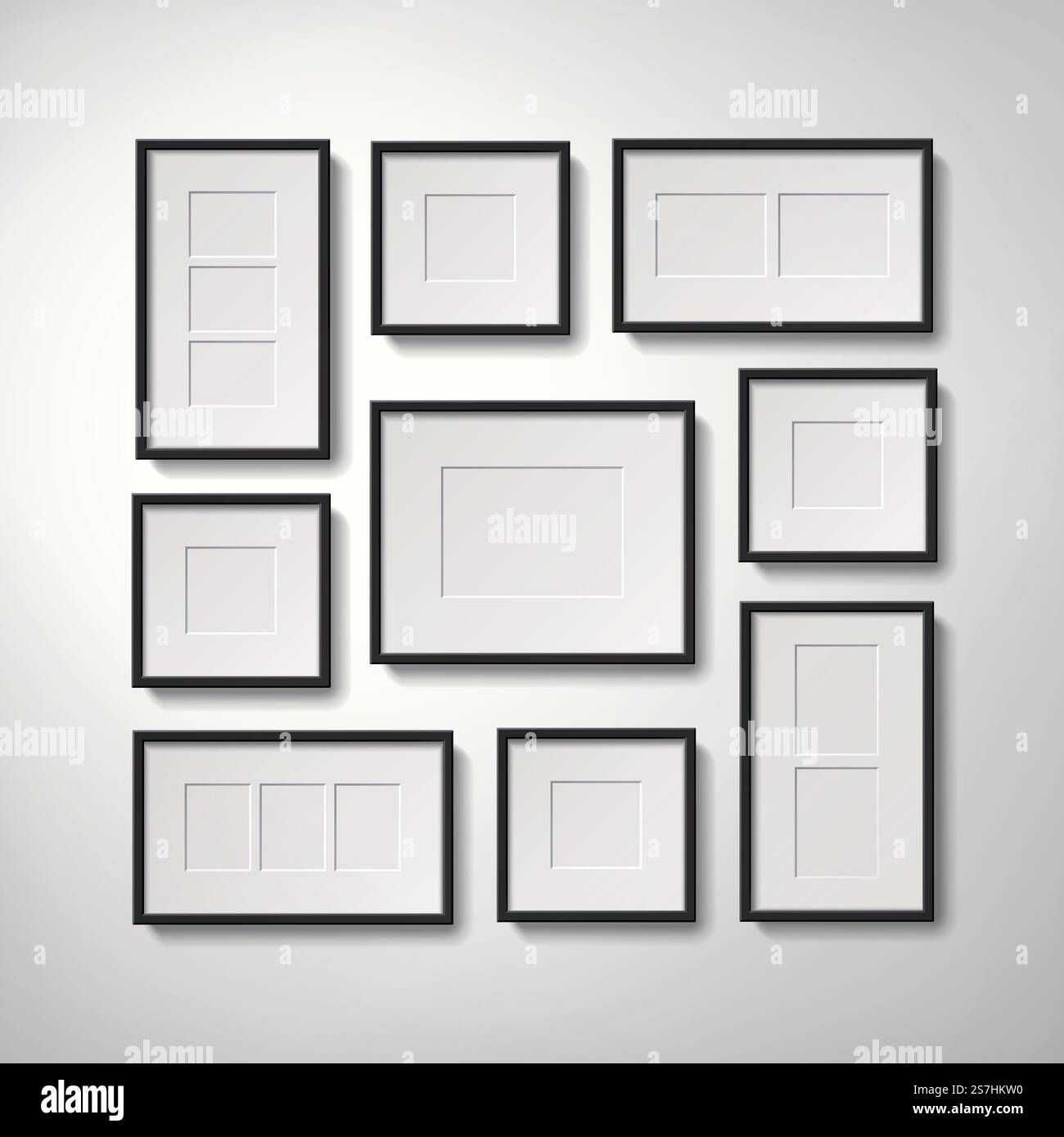 Realistic blank picture frames collection hanging on the wall in ...