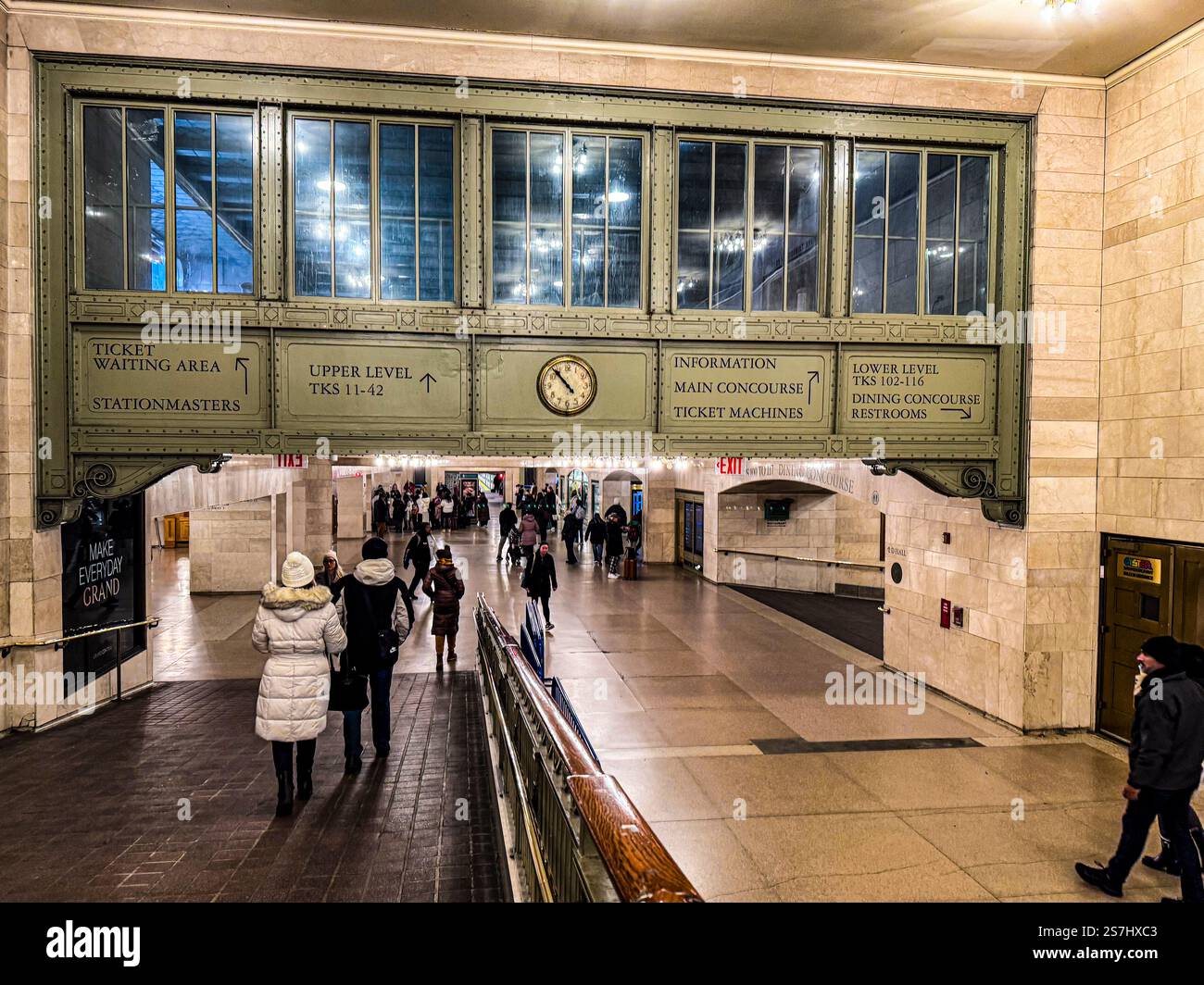 Ramp and travelers entering Grand Central Station with clock and ...