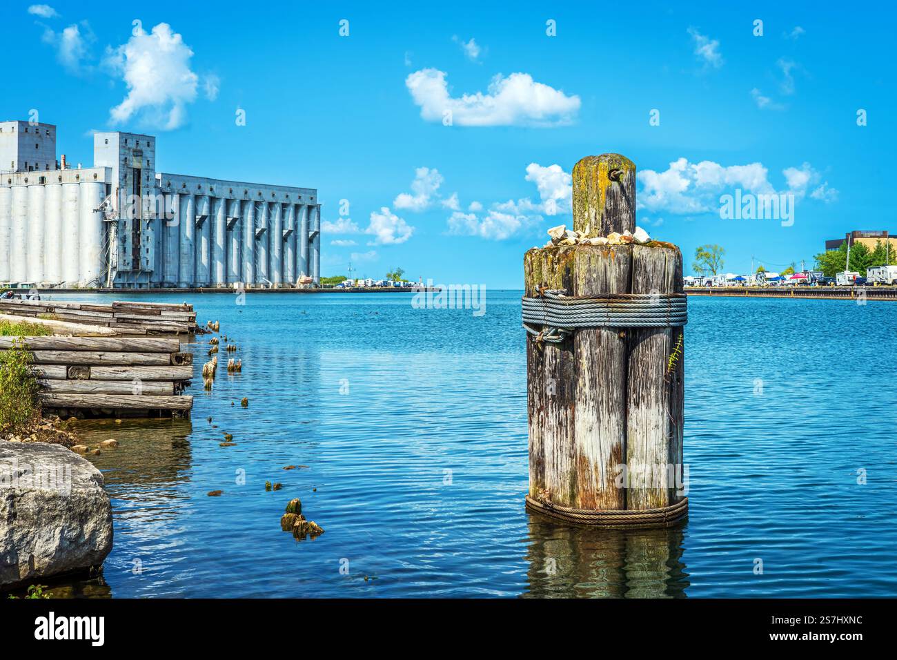 Old weathered wooden mooring post for boats photographed in summer in ...